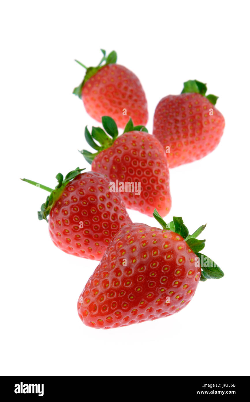 Five fresh strawberries isolated on a white background Stock Photo - Alamy