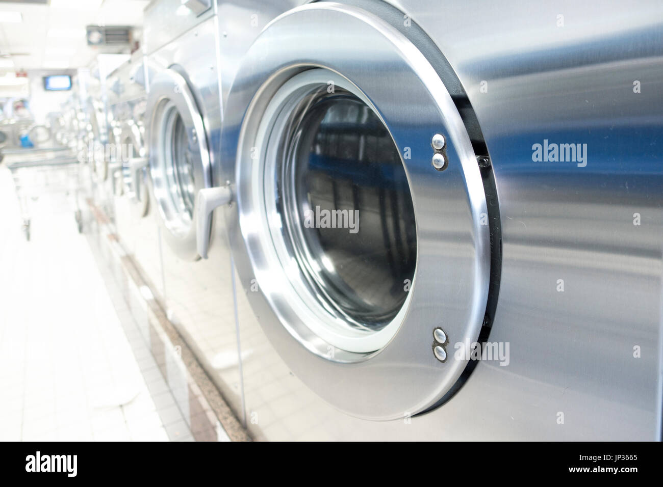 line of commercial washing appliances Stock Photo - Alamy