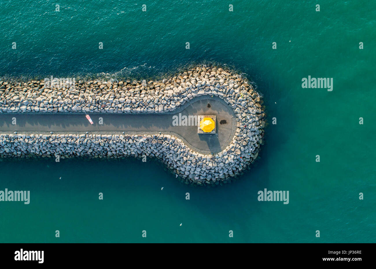 Aerial image of a lighthouse with people fishing Stock Photo - Alamy