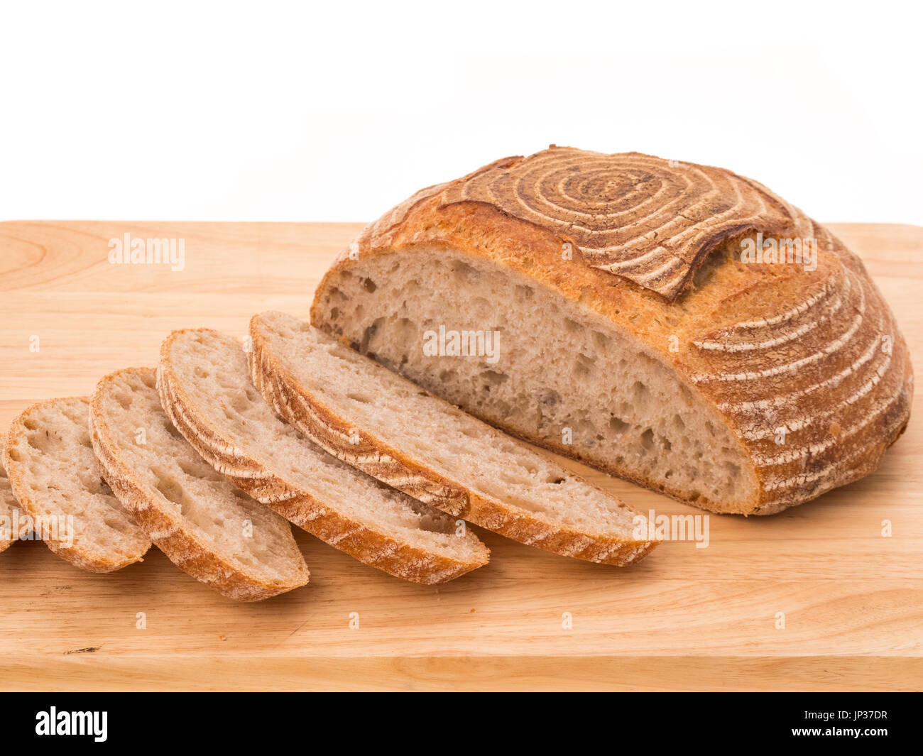 A fresh loaf of sour dough bread - white background Stock Photo - Alamy