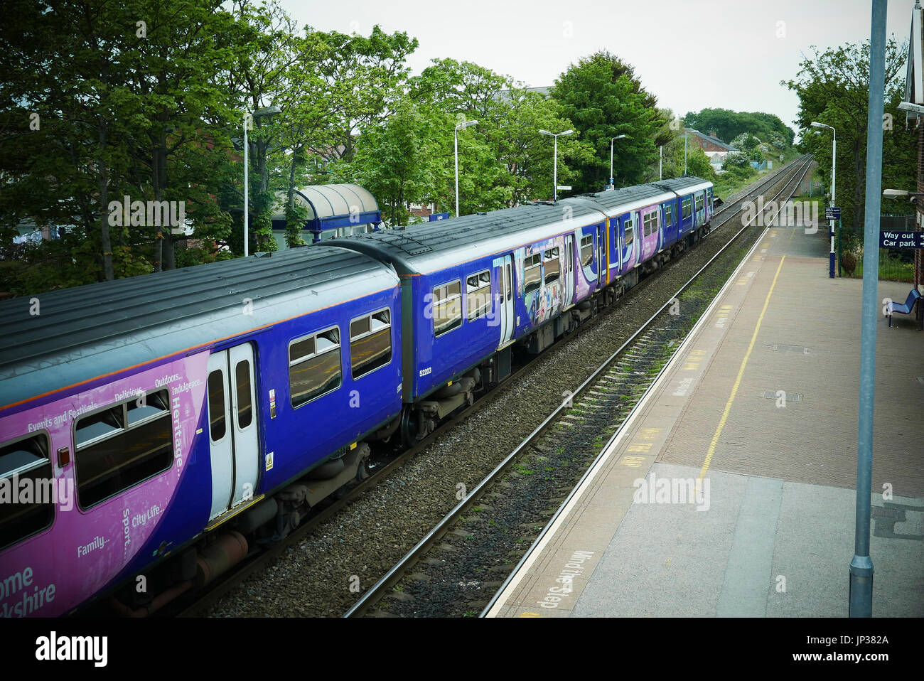 Trans pennine train passing through Layton railway station on its way ...