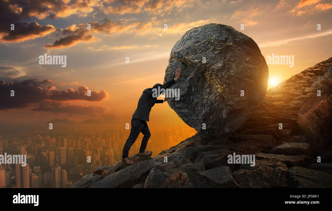 Pushing rock up hill hi-res stock photography and images - Alamy