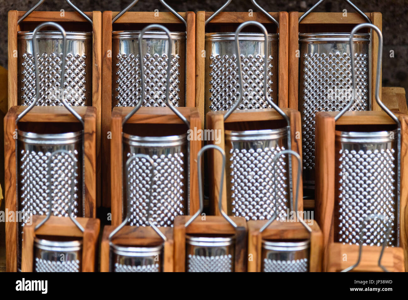 Graters stainless steel with a wooden package Stock Photo - Alamy