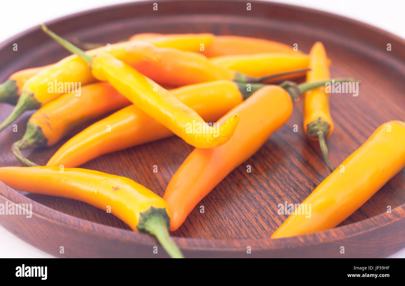 yellow chile on white background Stock Photo - Alamy
