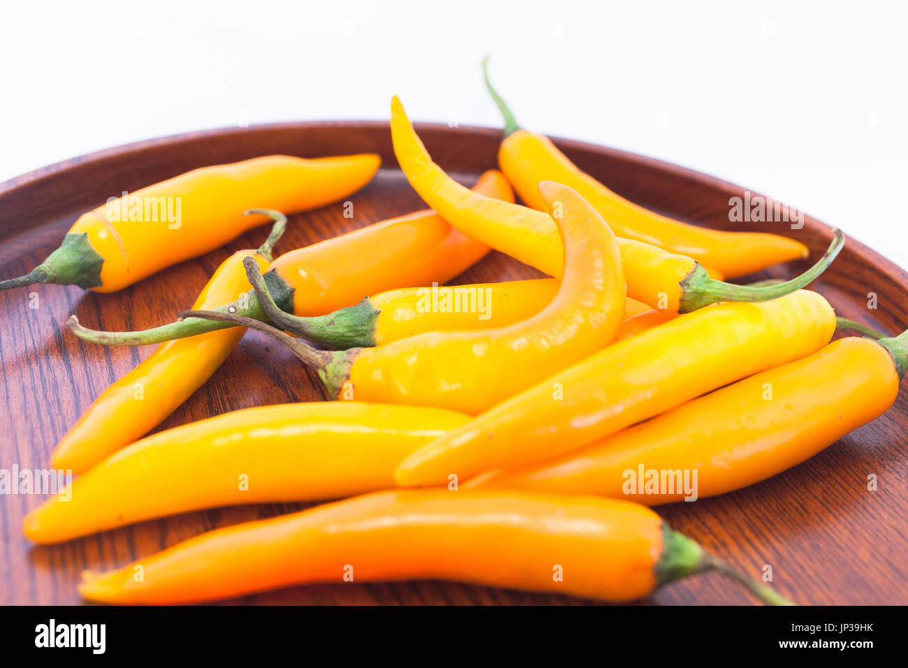 yellow chile on white background Stock Photo - Alamy