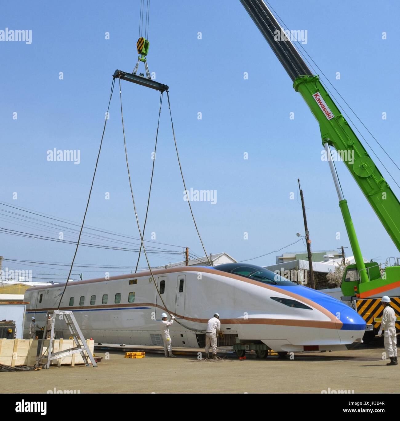 KOBE, Japan - A new W7 series bullet train for the Hokuriku Shinkansen ...