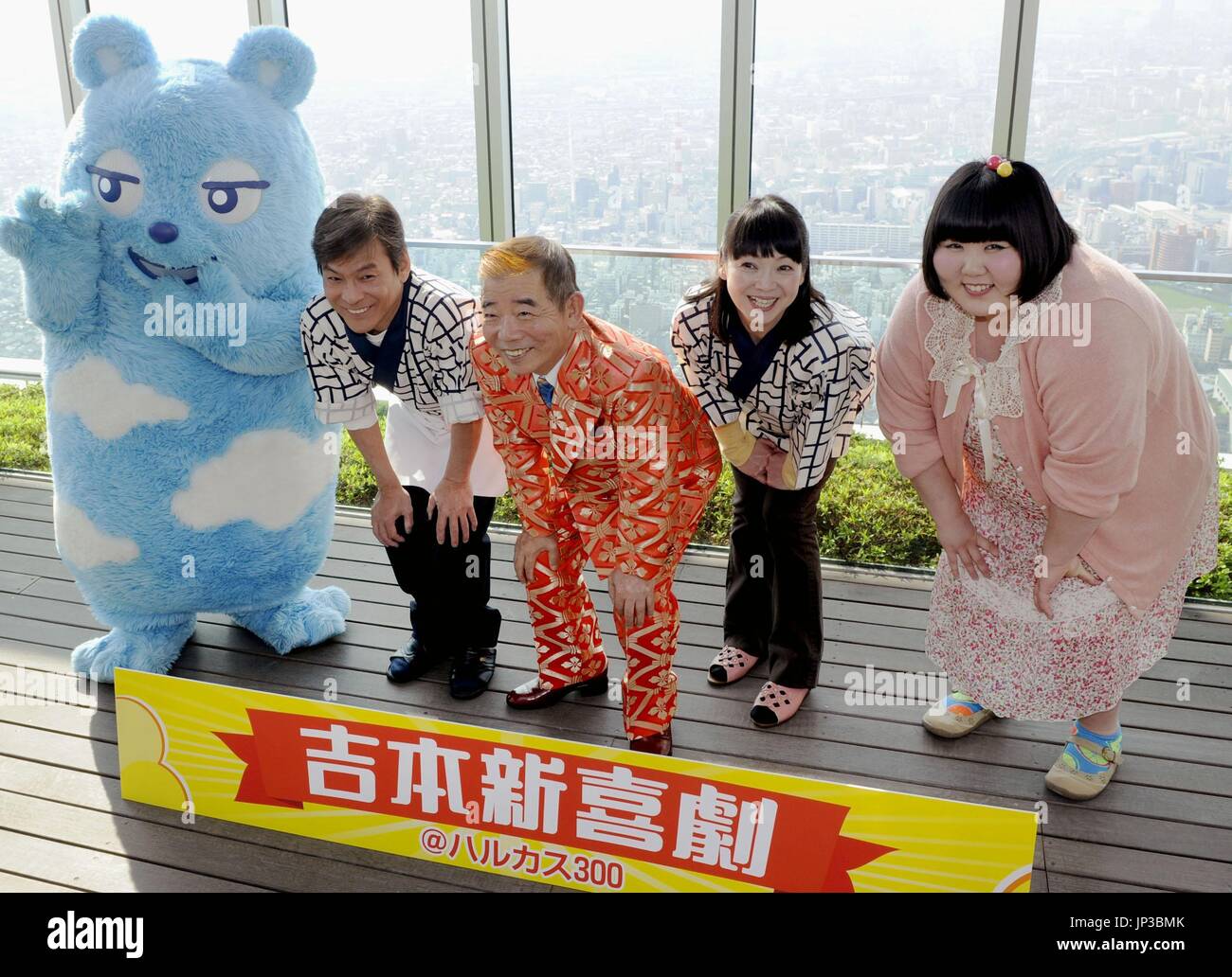 OSAKA, Japan - Medaka Ikeno (C) and fellow actors pose for photos after ...