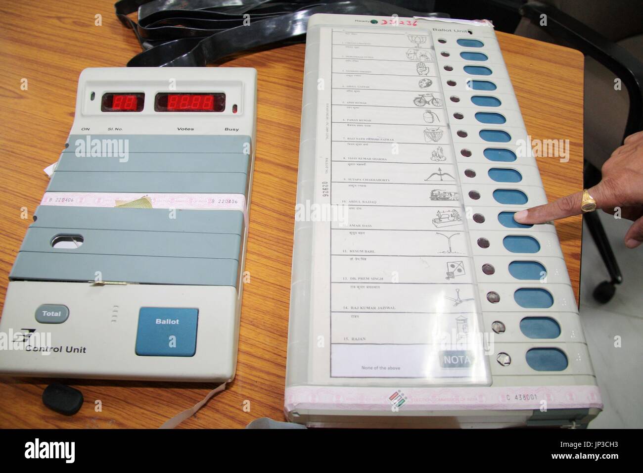 NEW DELHI, India - An electronic voting board (R) and counting machine ...