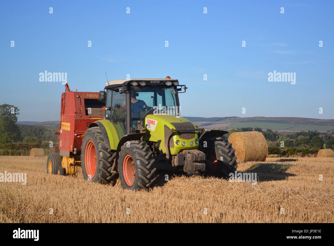 Tractor baling machine hi-res stock photography and images - Alamy