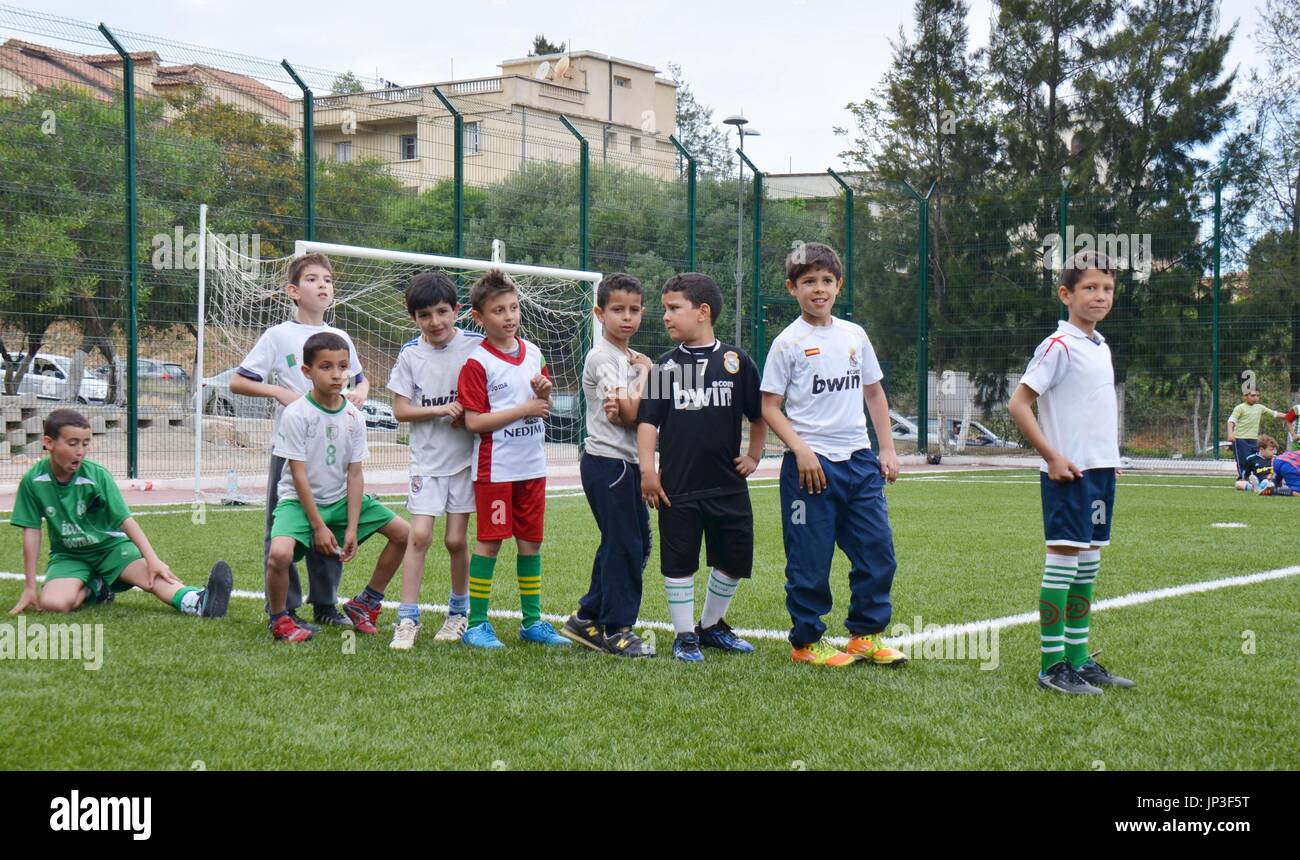 ALGIERS, Algeria - Children practice soccer in the Algerian capital of Algiers on April 15, 2014 ...