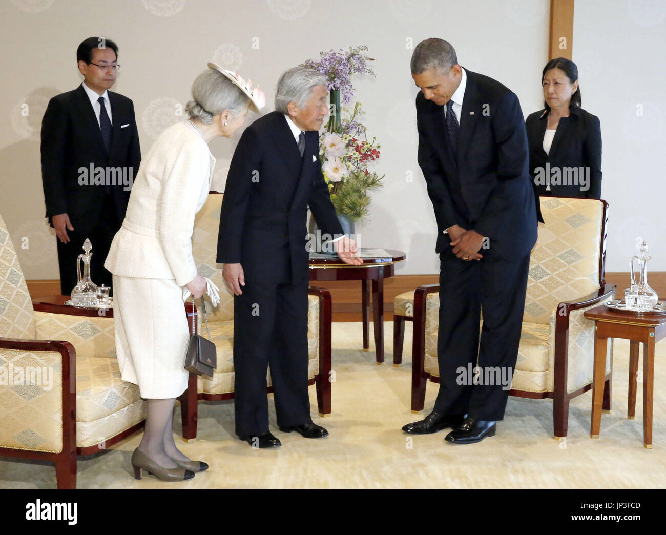 TOKYO, Japan - U.S. President Barack Obama (front R) bows before being ...