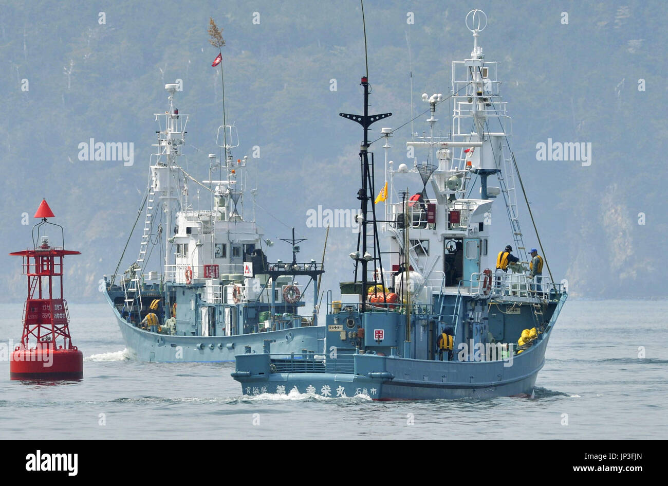ISHINOMAKI, Japan - Japanese research whaling ships depart from a port ...