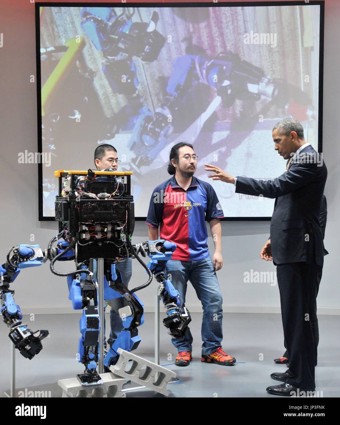 TOKYO, Japan - U.S. President Barack Obama listens to an explanation ...