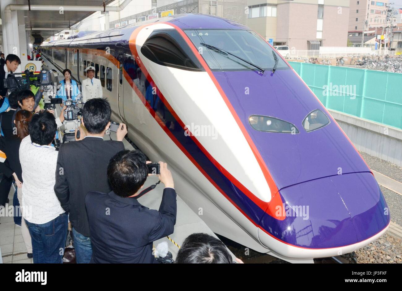 YAMAGATA, Japan - People take pictures of a Yamagata Shinkansen Tsubasa ...