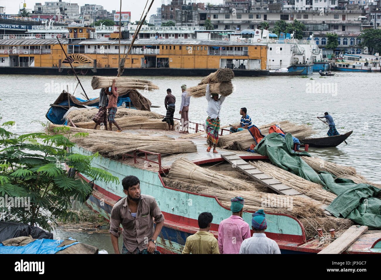 Workers on the docks in front of "the Rocket," paddle steamer ...