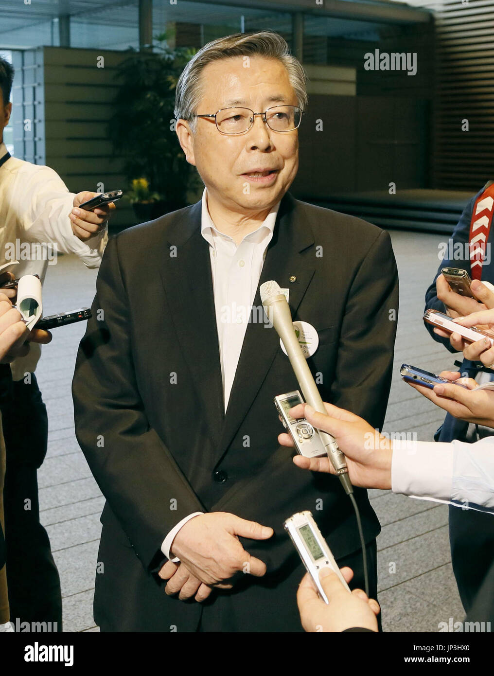 TOKYO, Japan - Fukushima Gov. Yuhei Sato speaks to reporters at the prime minister's office in ...