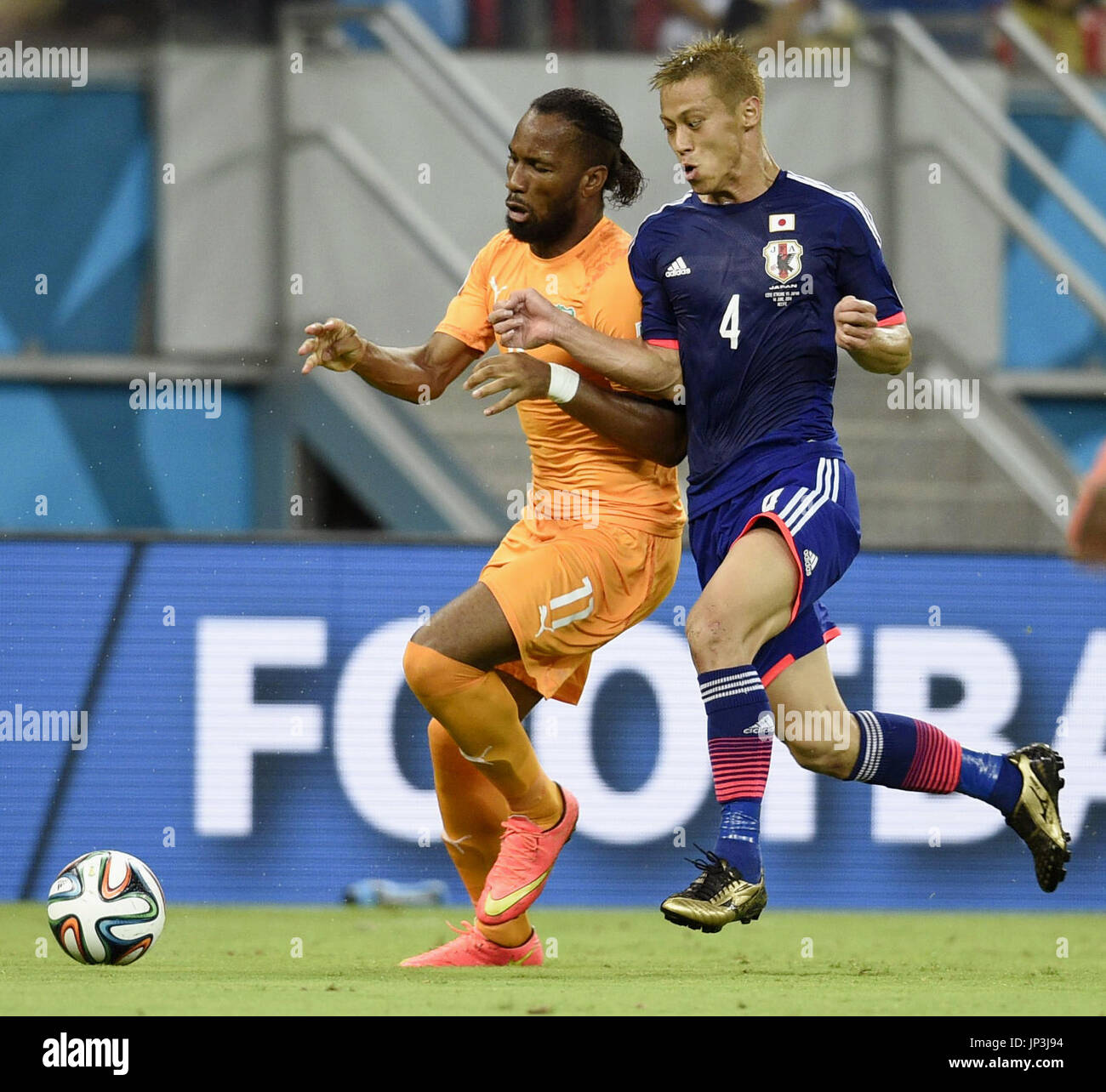 RECIFE, Brazil - Keisuke Honda of Japan (R) and Didier Drogba of Ivory ...