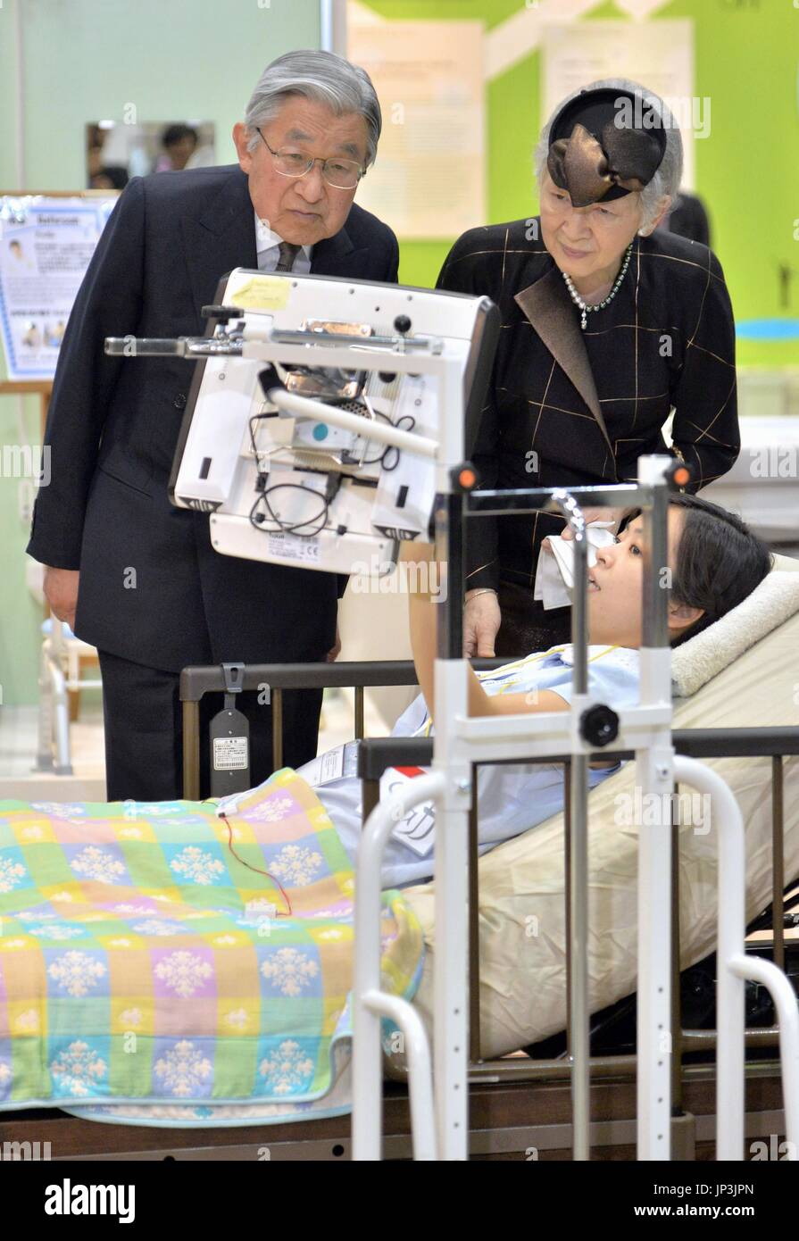 YOKOHAMA, Japan - Emperor Akihito and Empress Michiko visit an ...