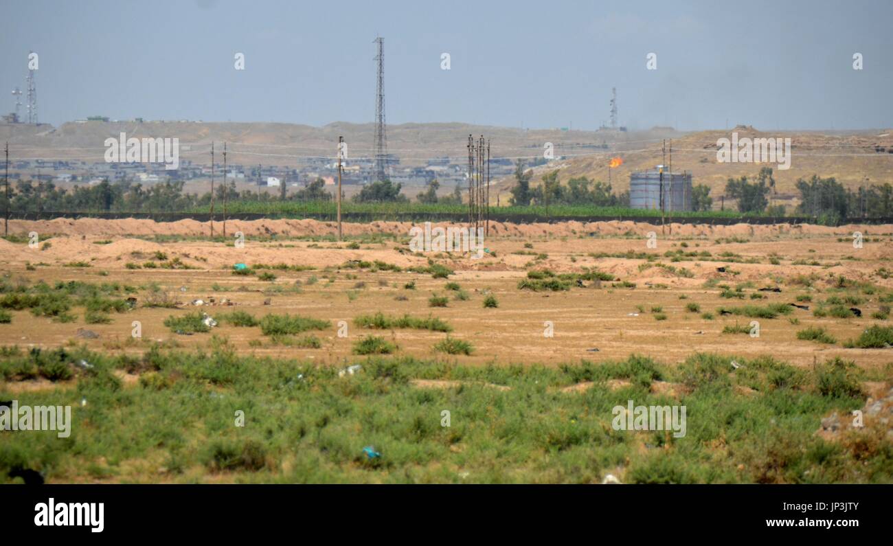 KIRKUK, Iraq - An oilfield facility in Kirkuk, northern Iraq, is ...