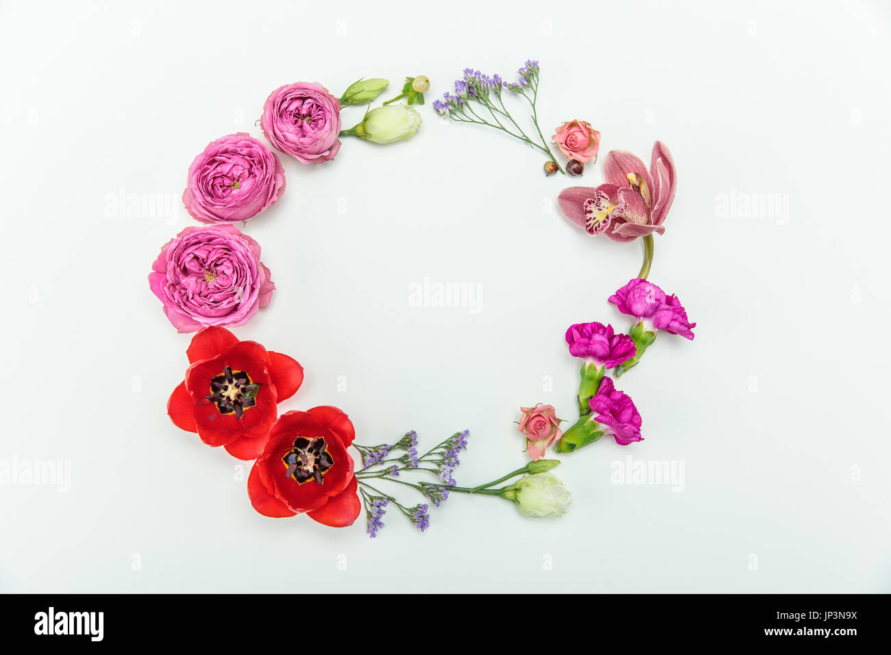 Top view of beautiful floral wreath with roses and poppies isolated on ...