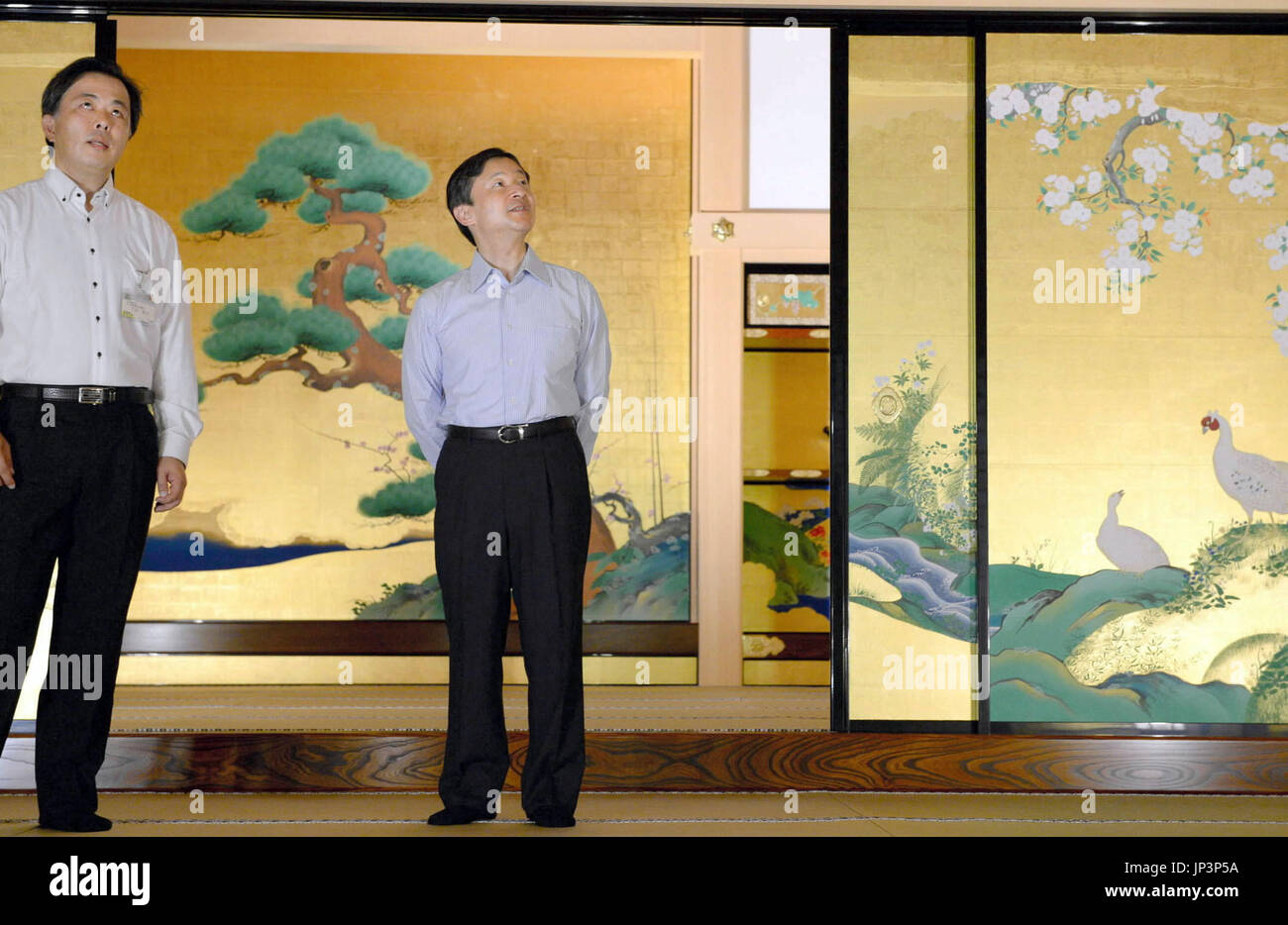 NAGOYA, Japan - Crown Prince Naruhito (R) observes the Nagoya Castle's ...