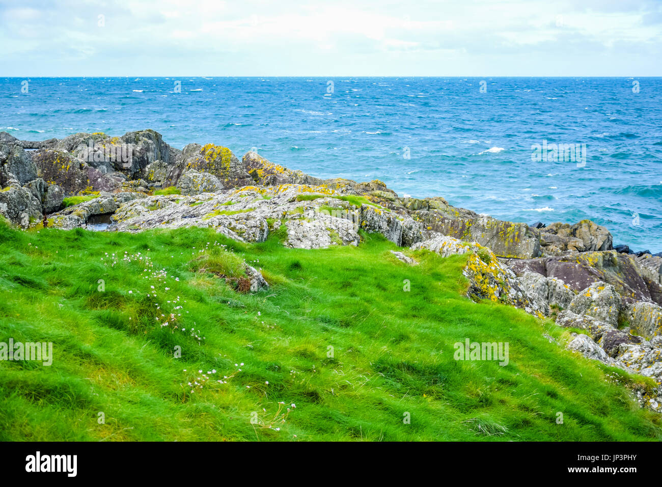 Landscape view of Peel hill rocky seashore, Isle of Man Stock Photo - Alamy