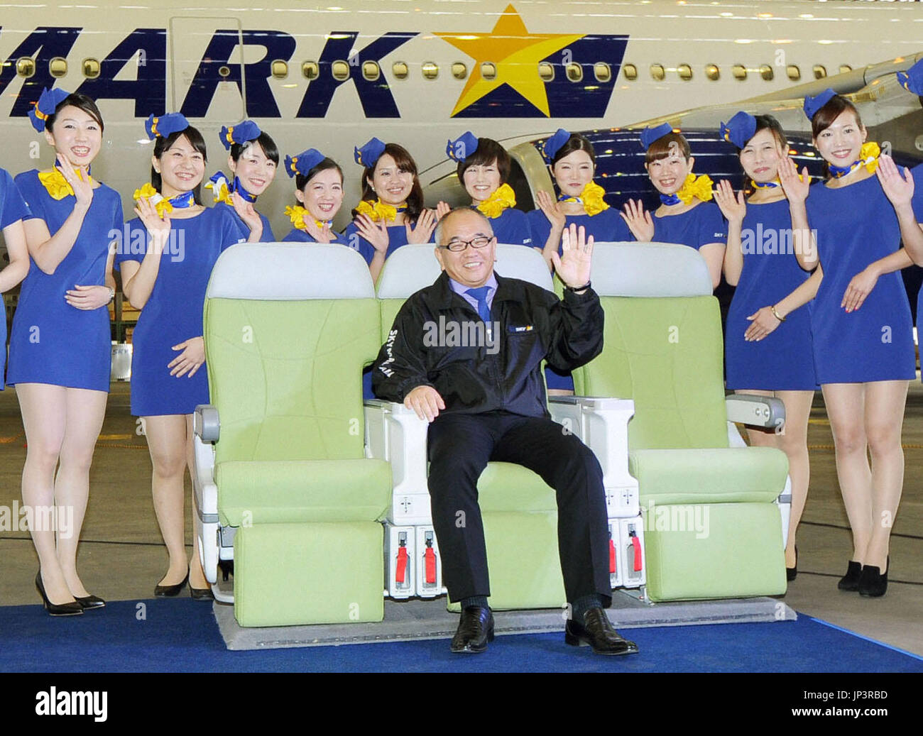 TOKYO, Japan - Skymark Airlines President Shinichi Nishikubo sits on a ...