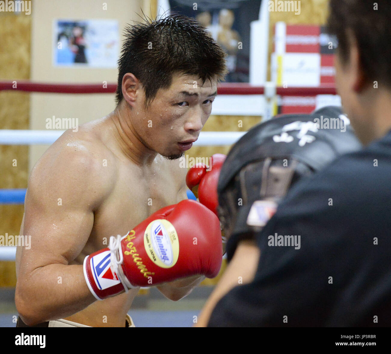 KOBE, Japan - Japanese boxer Hozumi Hasegawa practices in Kobe on March ...