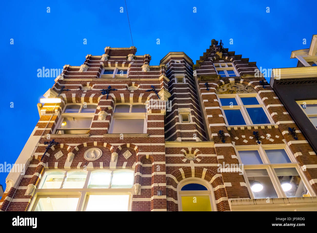 Beautiful buildings in Amsterdam - evening view - AMSTERDAM ...