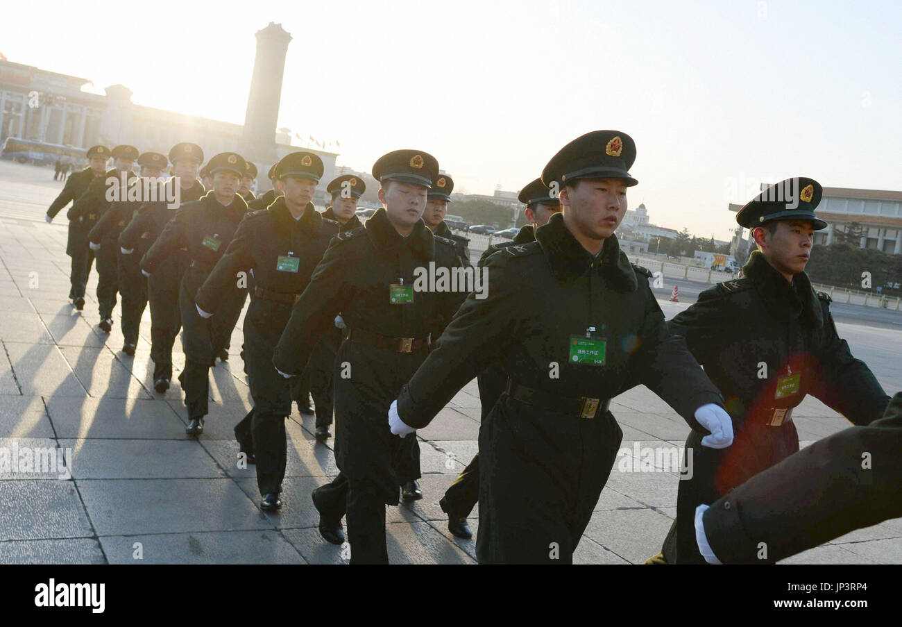 BEIJING, China - Security officers patrol outside the Great Hall of the ...