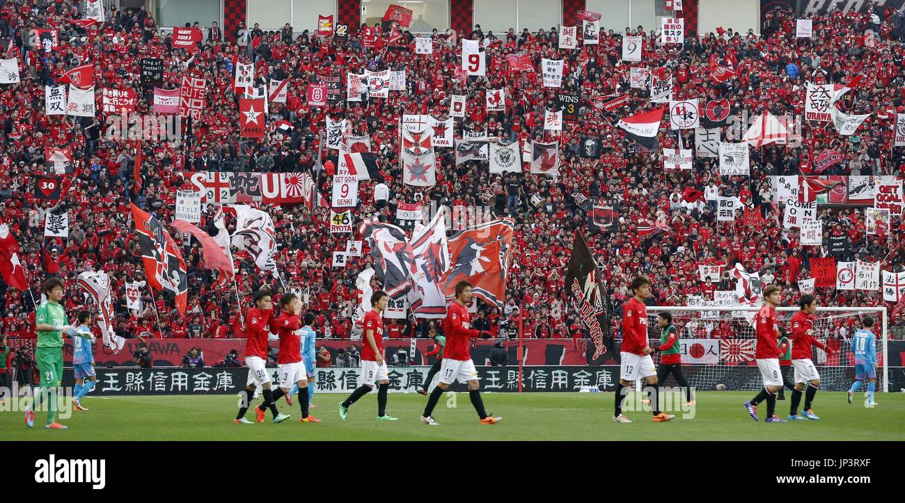 TOKYO, Japan - Photo shows Urawa Reds supporters holding various ...