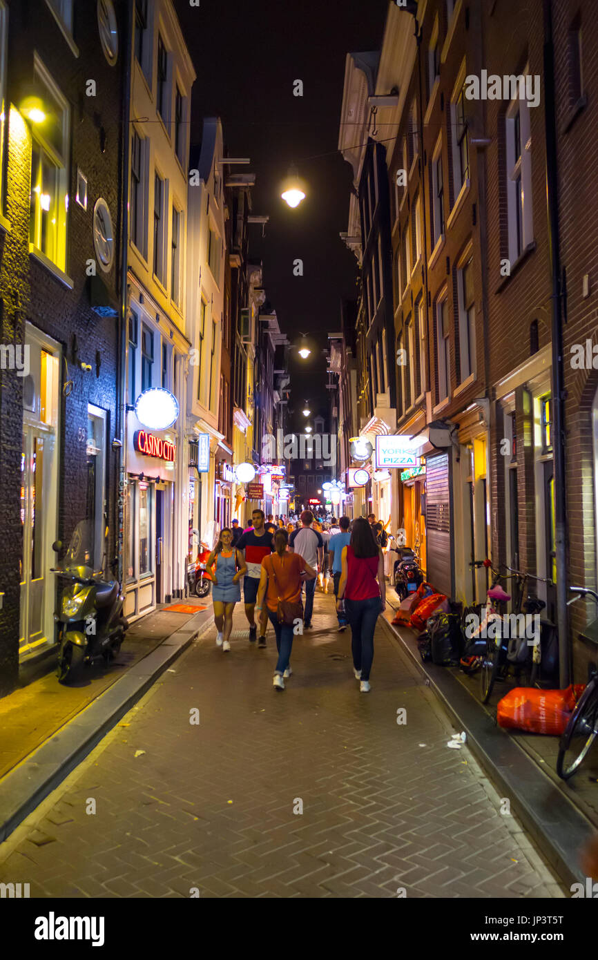 The pedestrian zones of Amsterdam - busy place at night - AMSTERDAM ...