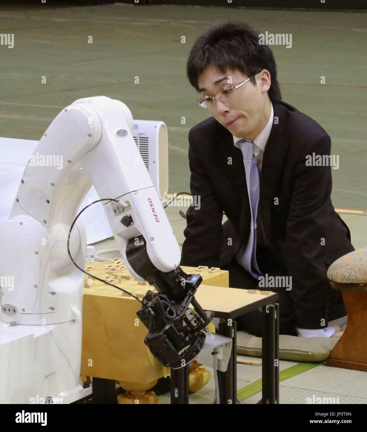 TOKYO, Japan - Tatsuya Sugai, a professional player of shogi, or ...