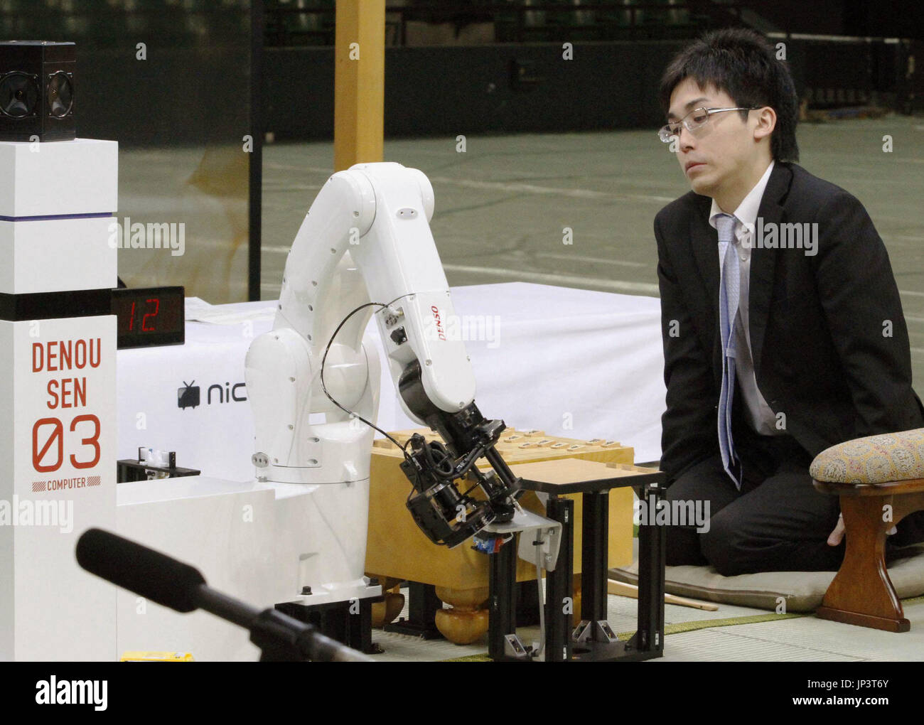 TOKYO, Japan - Tatsuya Sugai, a professional player of shogi, or ...