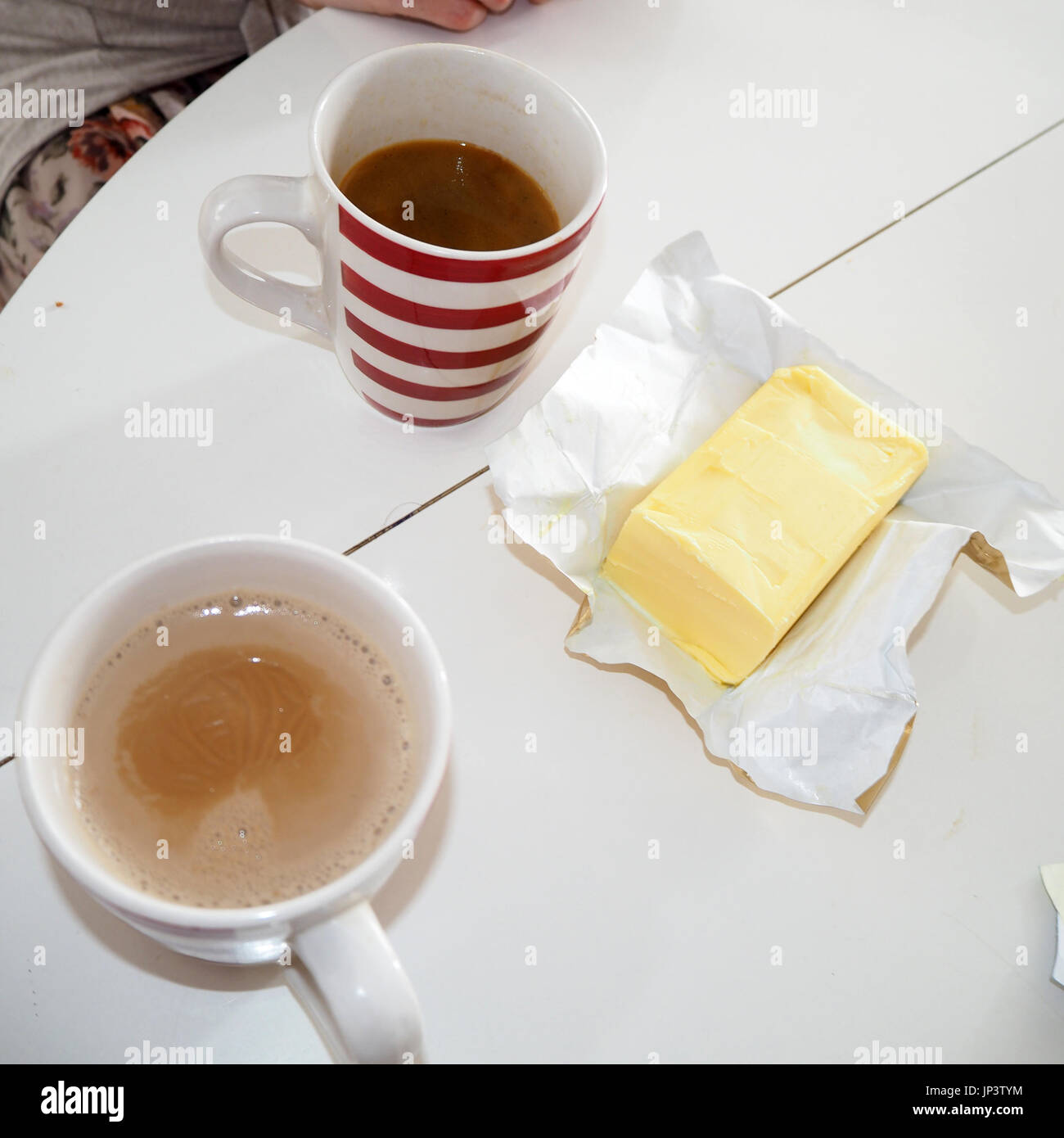 Skin on top of milky coffee Stock Photo - Alamy
