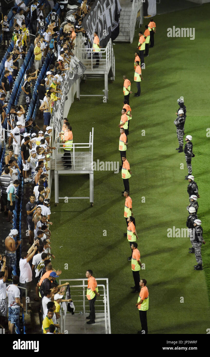 NATAL, Brazil - Security guards keep a watchful eye on the Arena das ...