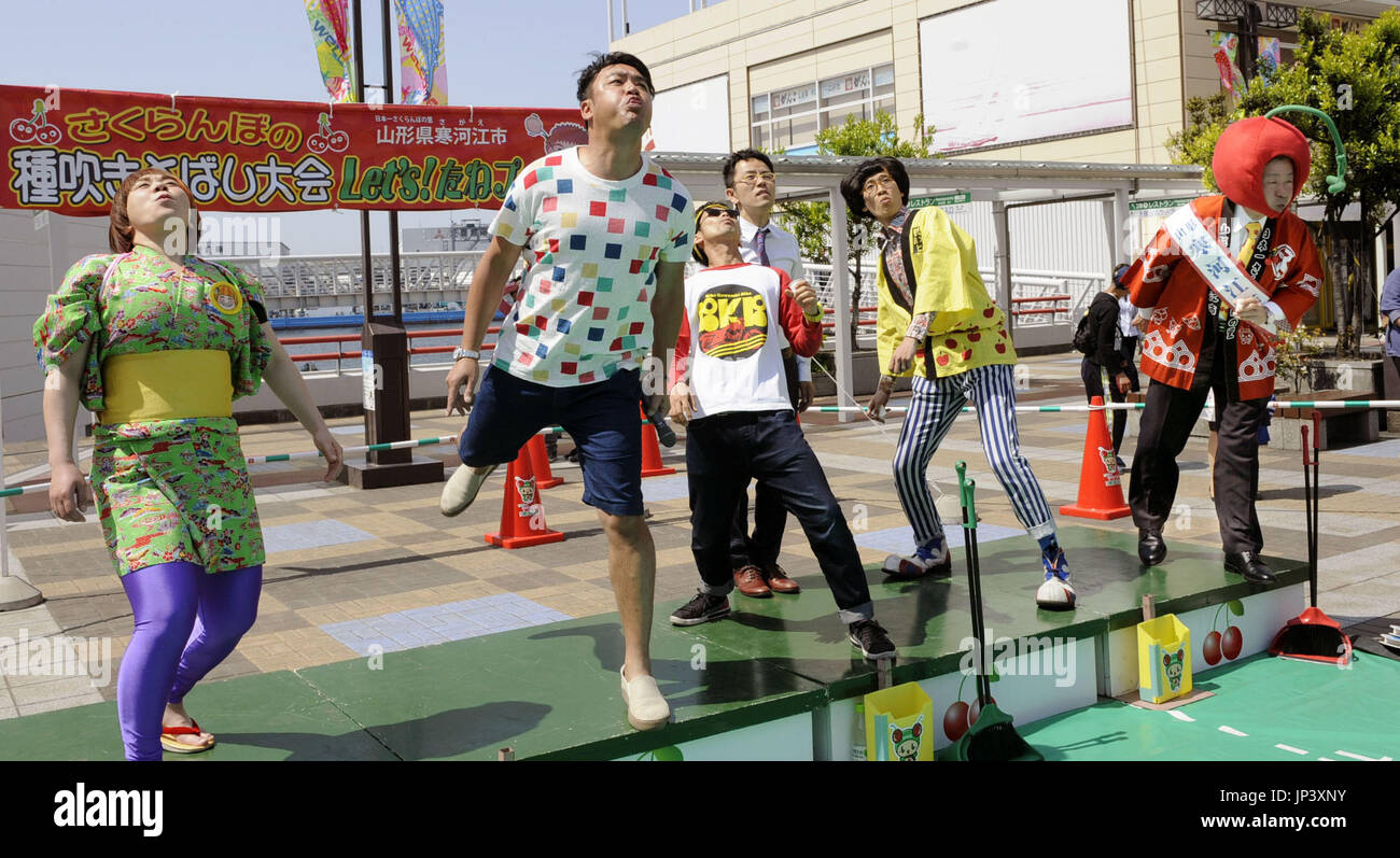 OSAKA, Japan - Comedian Kenji Tamura (2nd from L) and other people ...