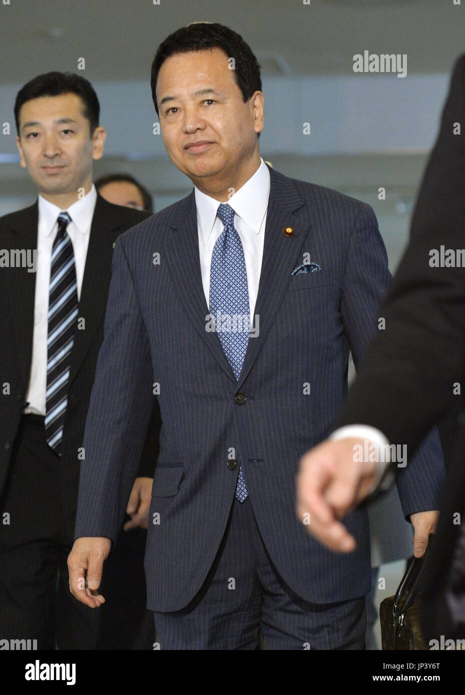 NARITA, Japan - Akira Amari (C), Japan's minister in charge of talks ...