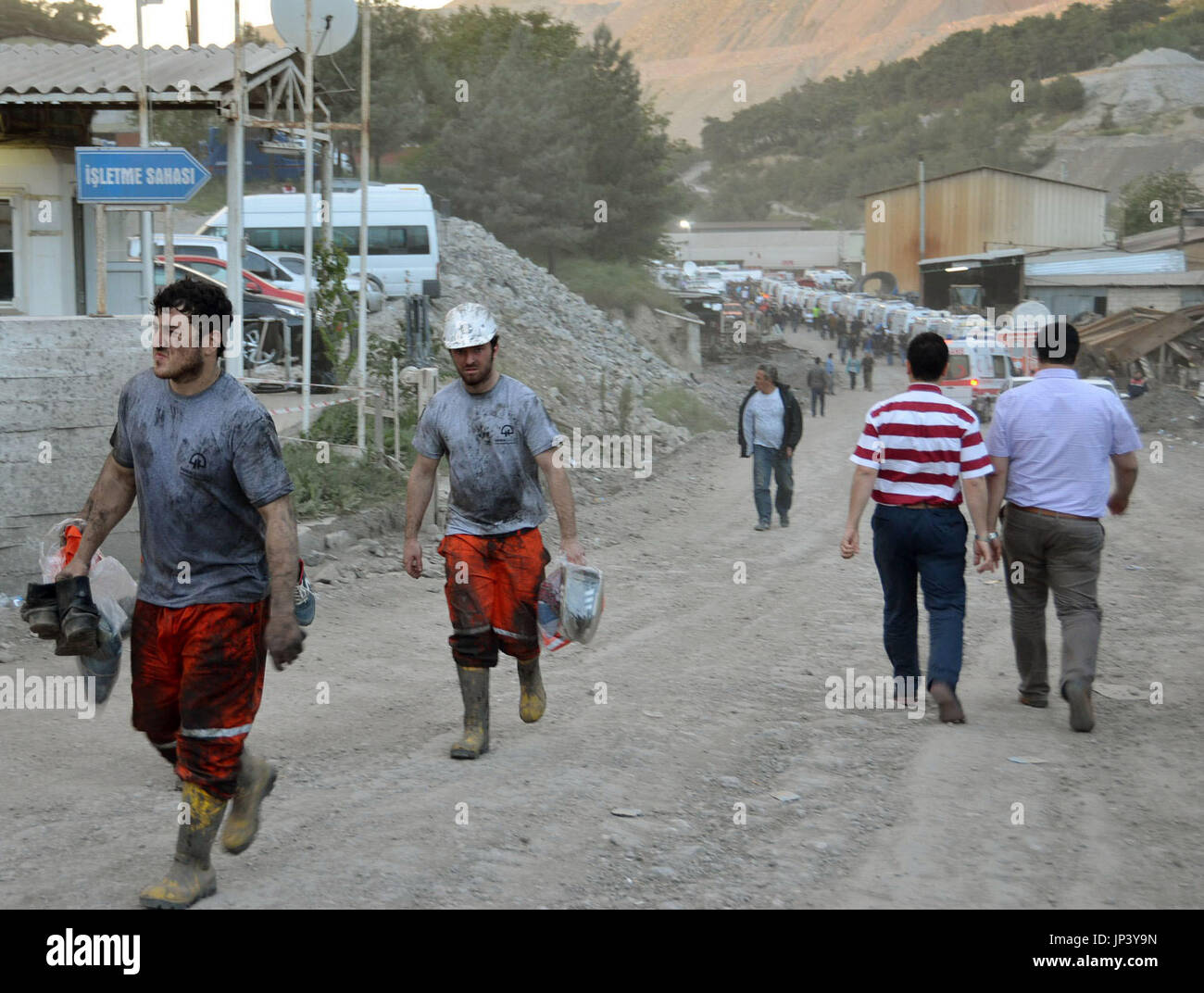 SOMA, Turkey - Mine workers walk along the street adjacent to a Turkish ...
