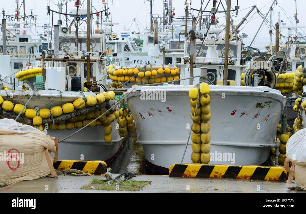 SOMA, Japan - Fishing boats are berthed at Matsukawaura port in Soma ...