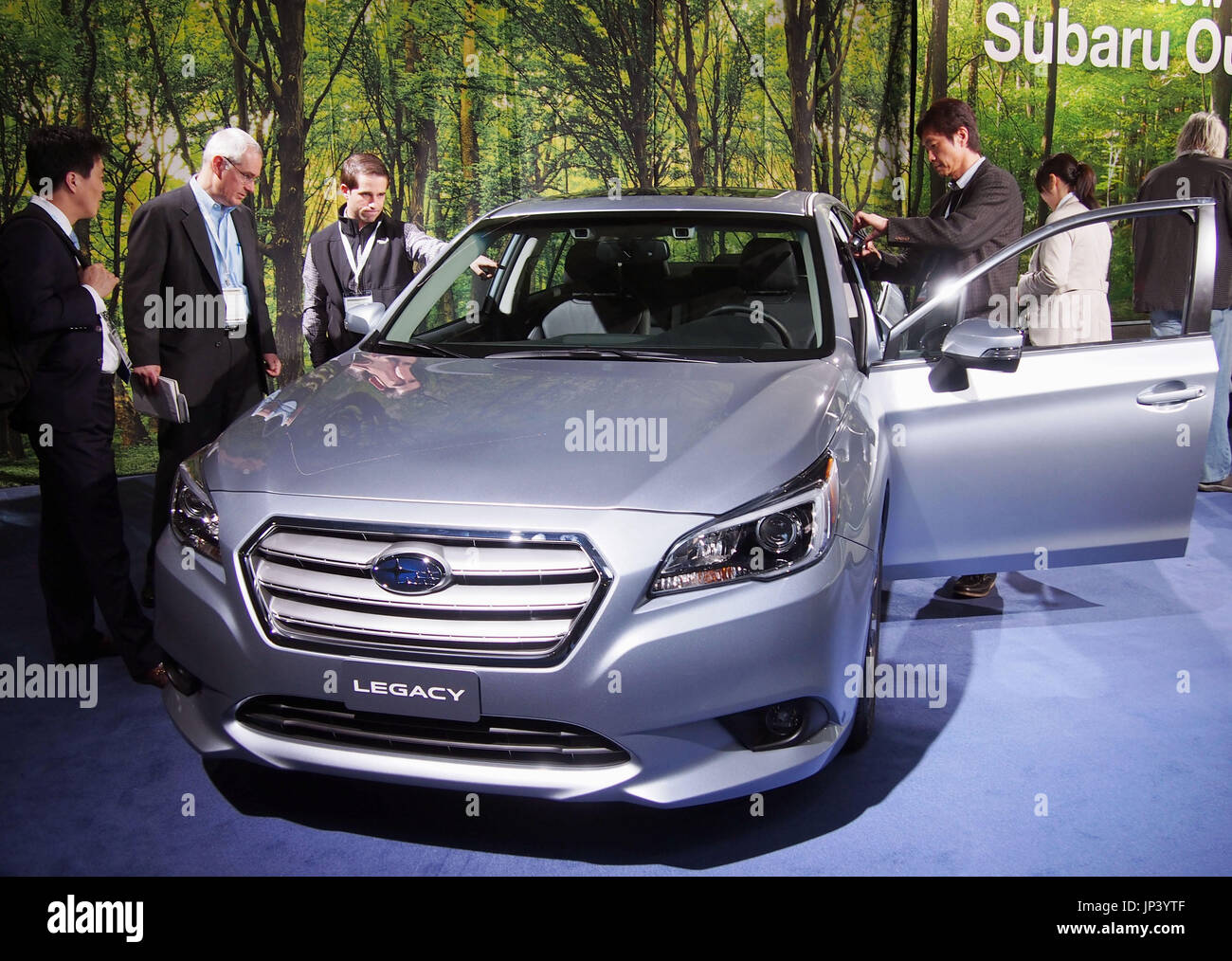 NEW YORK, United States - People take a look at Fuji Heavy Industries ...