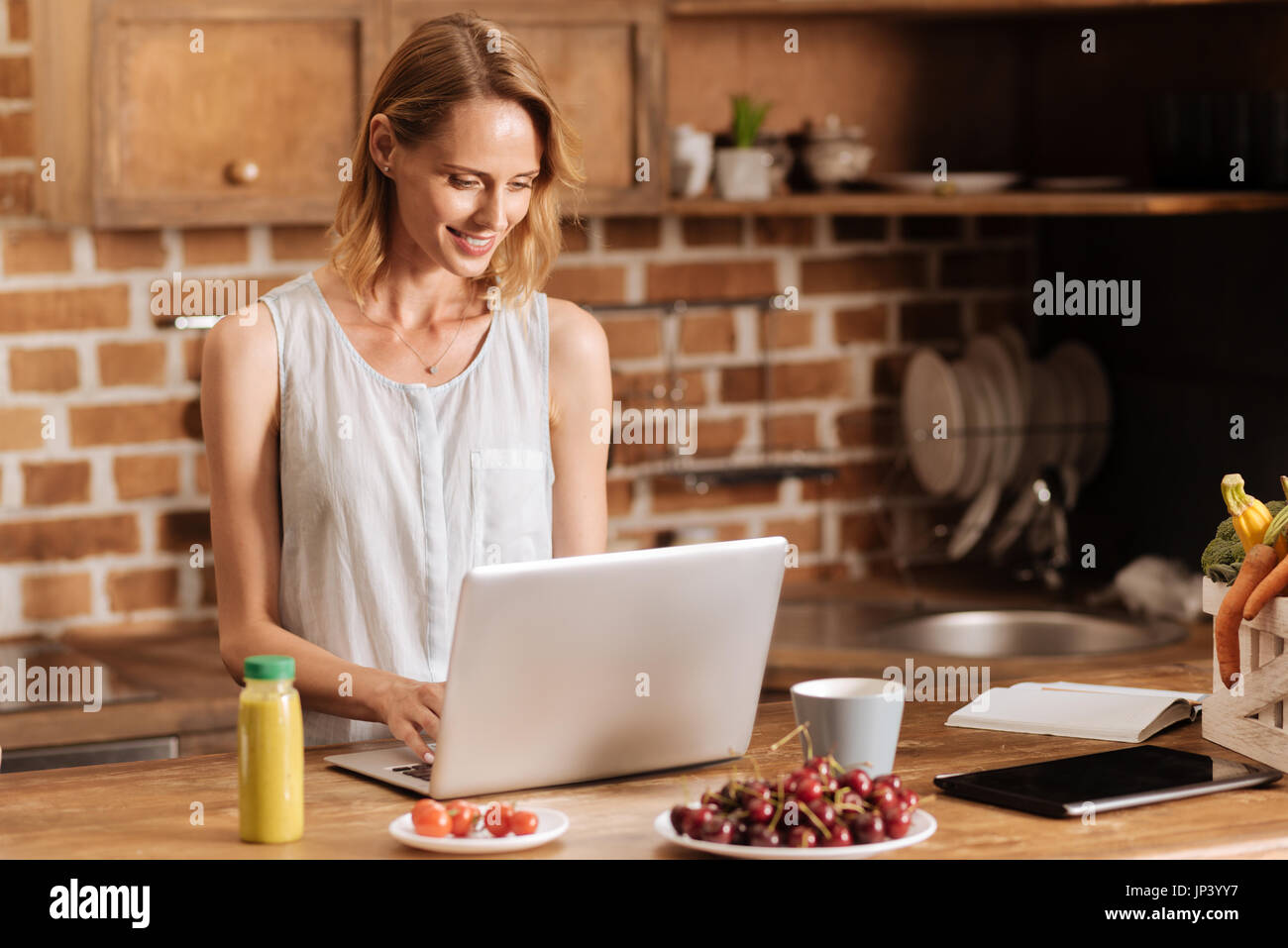Clever committed woman working from home Stock Photo - Alamy