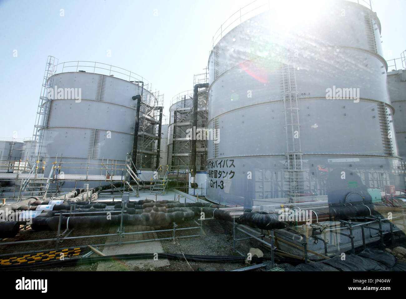 TOKYO, Japan - Temporary groundwater storage tanks at the crippled ...