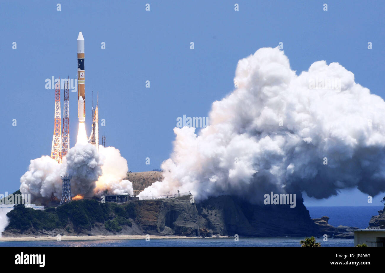 TANEGASHIMA, Japan - Japan's H-2A rocket carrying the land observing ...