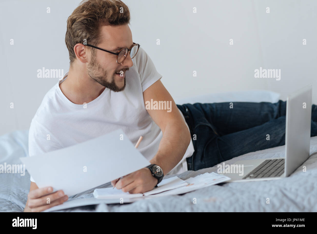 Positive male person enjoying his work Stock Photo - Alamy