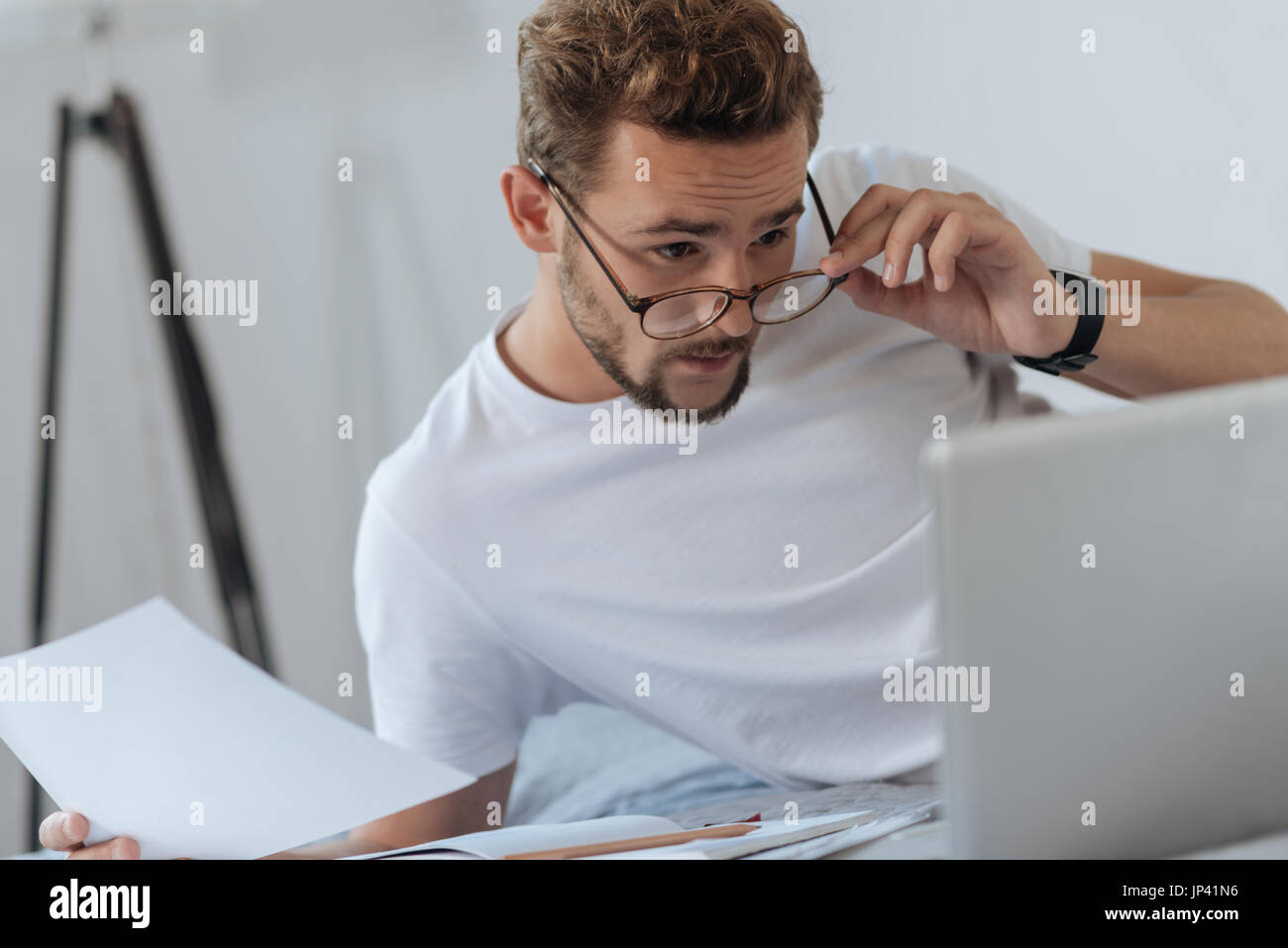 Confused smile work hi-res stock photography and images - Alamy