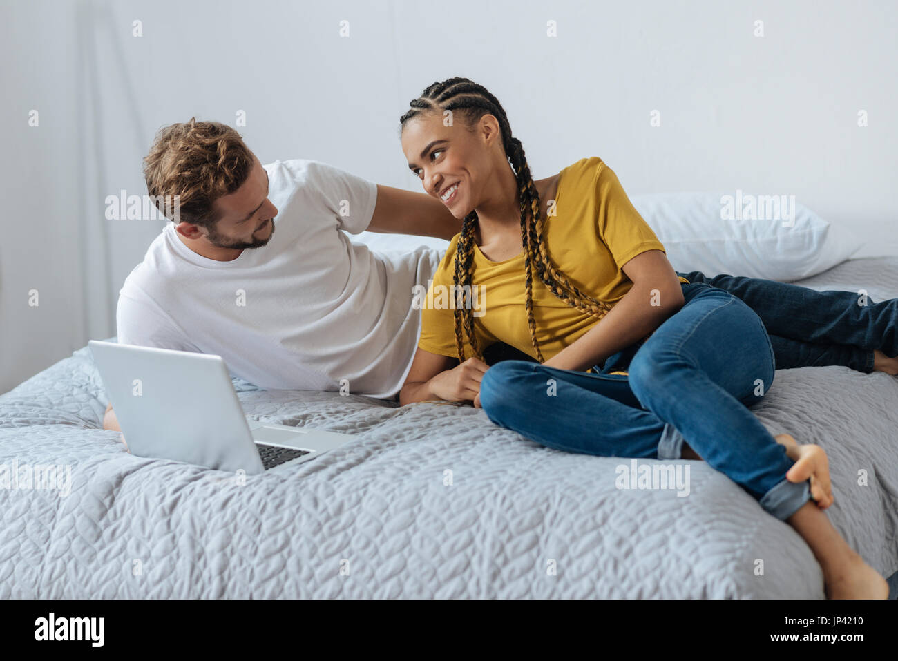 Positive delighted couple having rest Stock Photo - Alamy