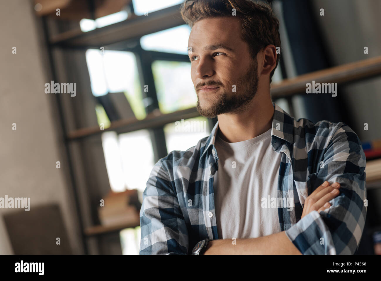 Handsome young man being deep in thoughts Stock Photo - Alamy