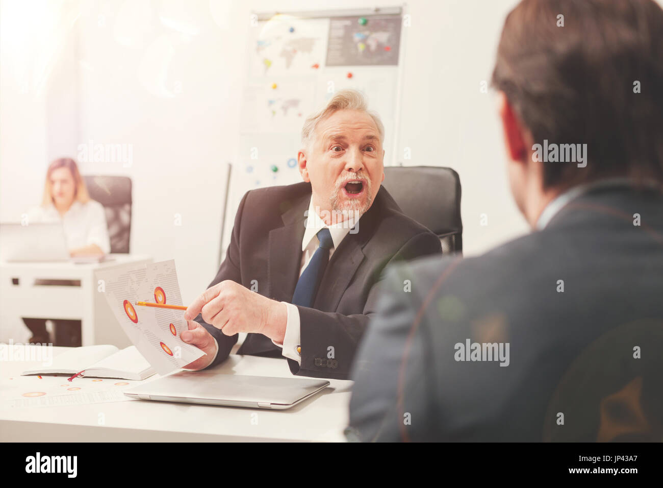 Angry disappointed executive shouting at the employee Stock Photo - Alamy