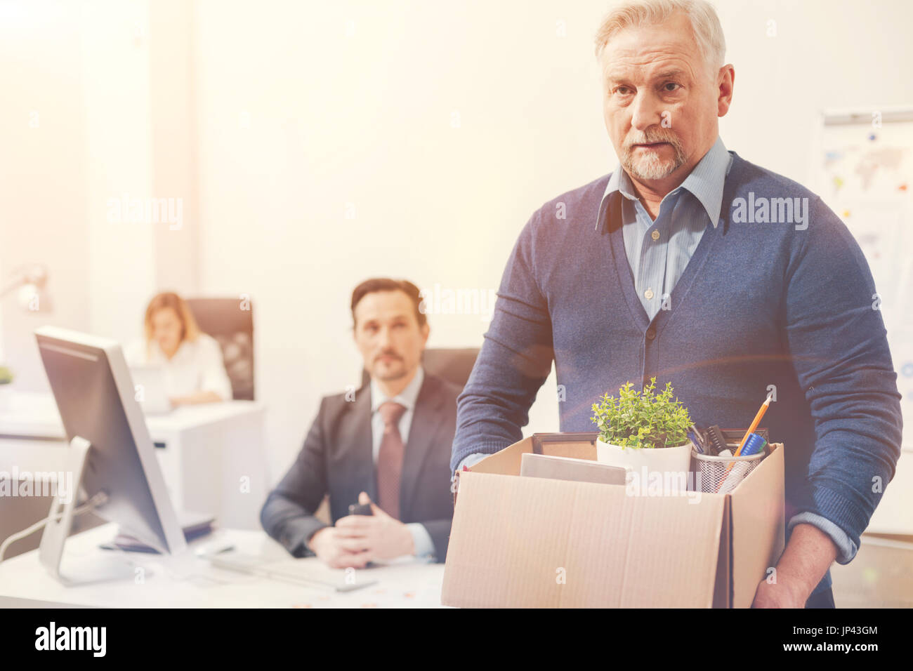 Elderly qualified businessman leaving the office Stock Photo - Alamy